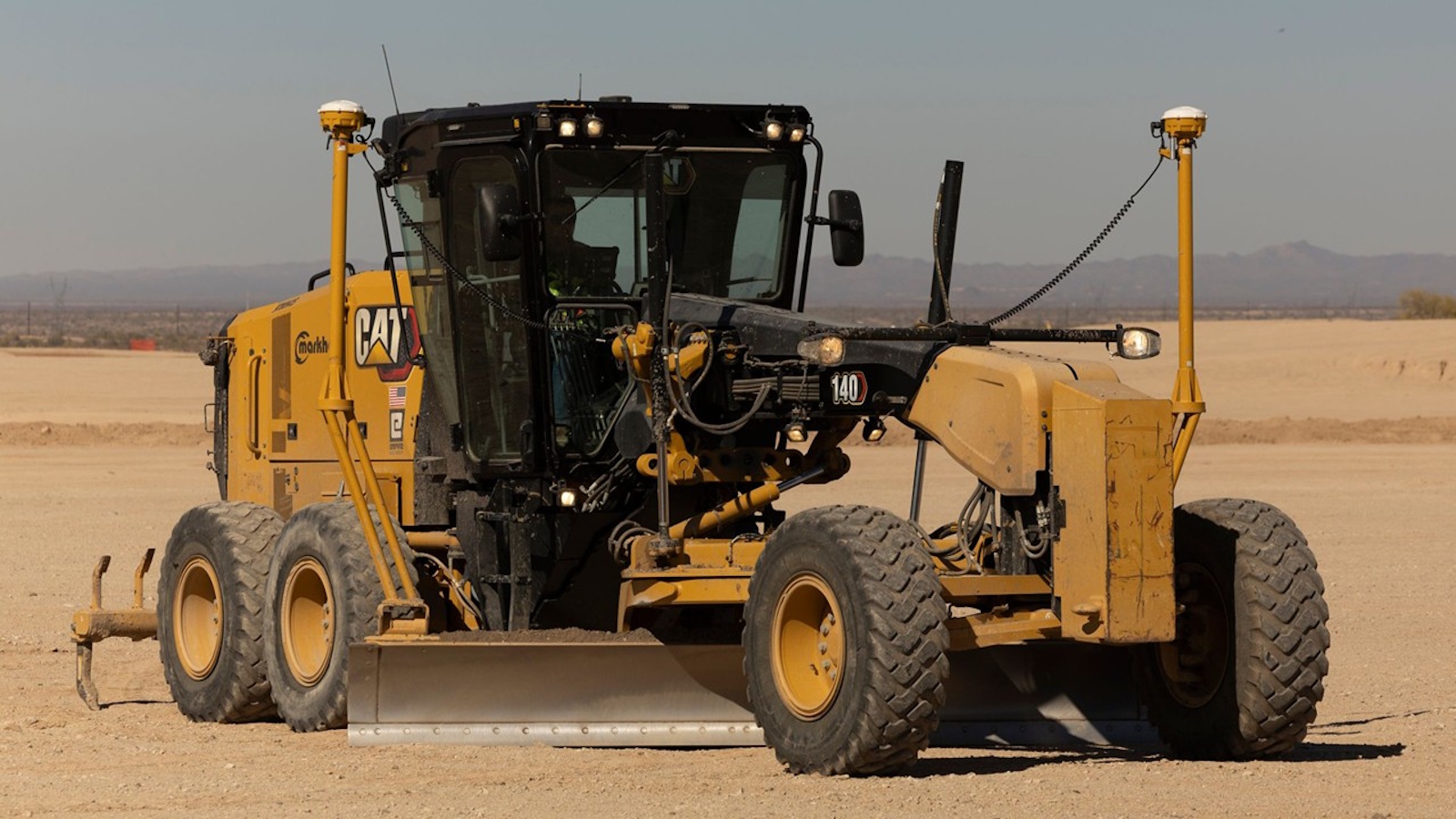 Caterpillar motor grader – Rental Management Media Group